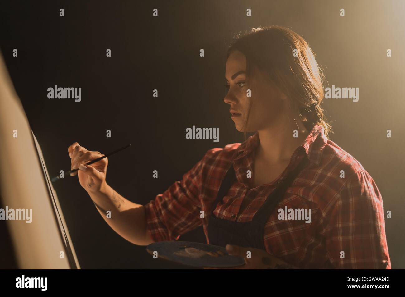 Artist painter works in art workshop abstract masterpiece painting ...