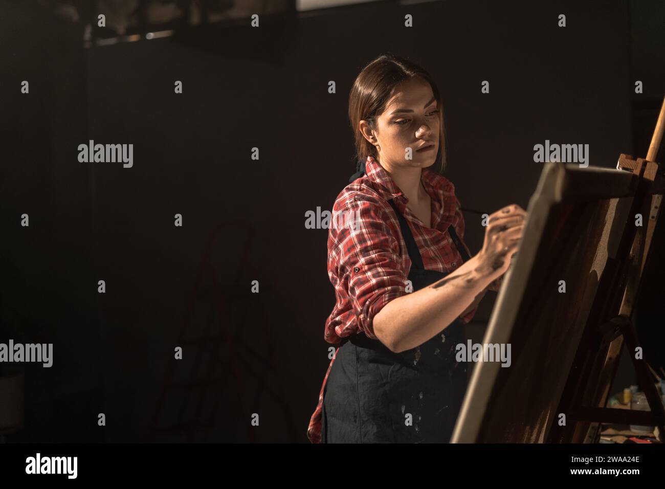 Artist painter works in art workshop abstract masterpiece painting ...