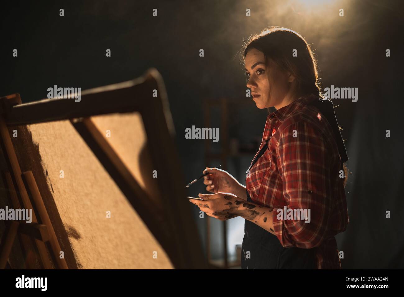 Artist painter works in art workshop abstract masterpiece painting ...