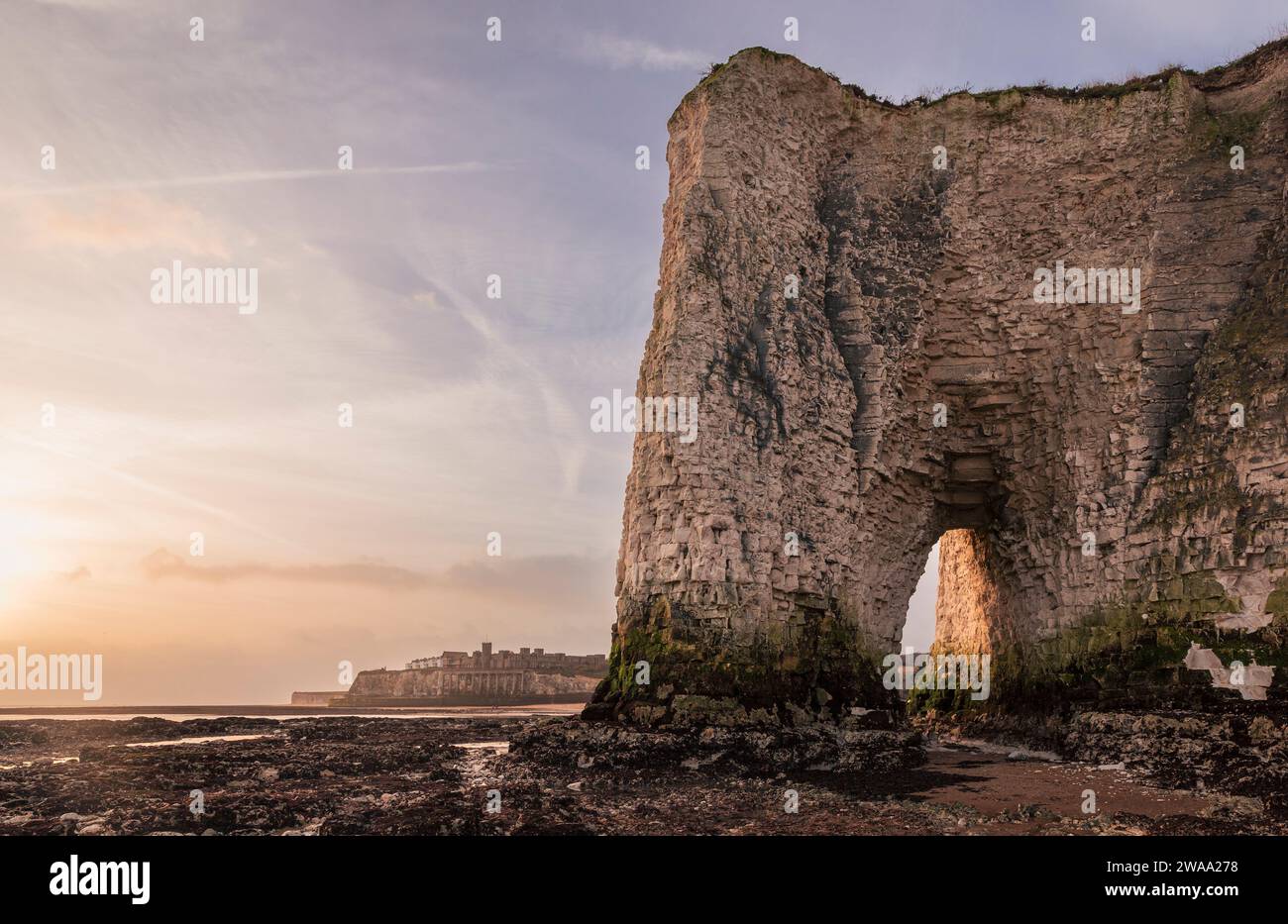 The distinctive sea stacks and archway in the chalk cliffs between ...