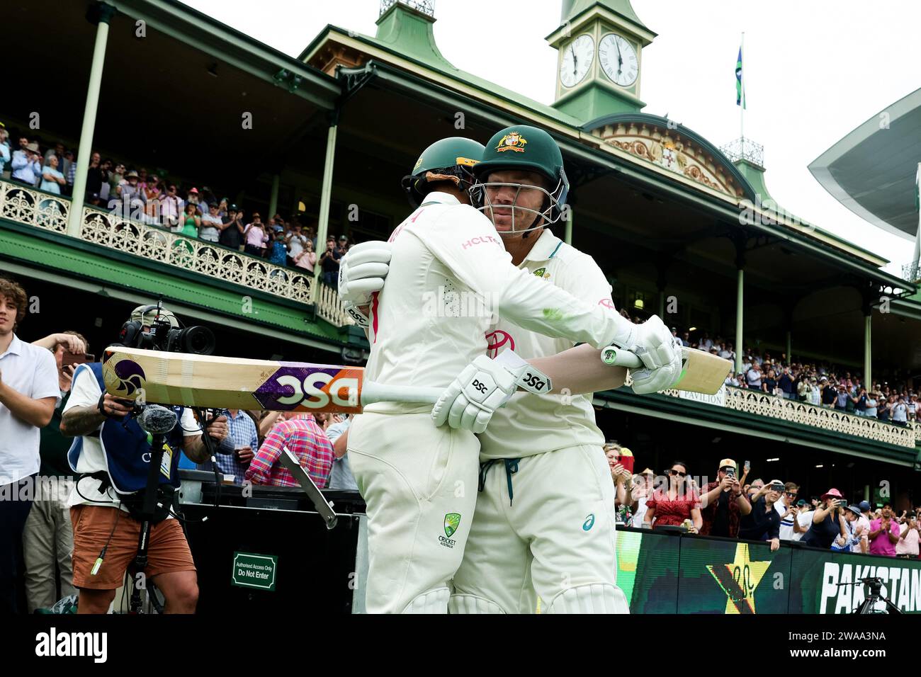 Sydney, Australia, 3 January, 2024. David Warner of Australia embraces ...