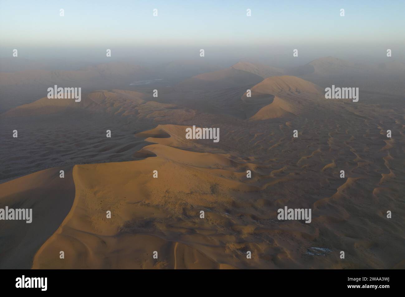 Aerial photo shows the Badain Jaran Desert of Alxa Right Banner, north ...