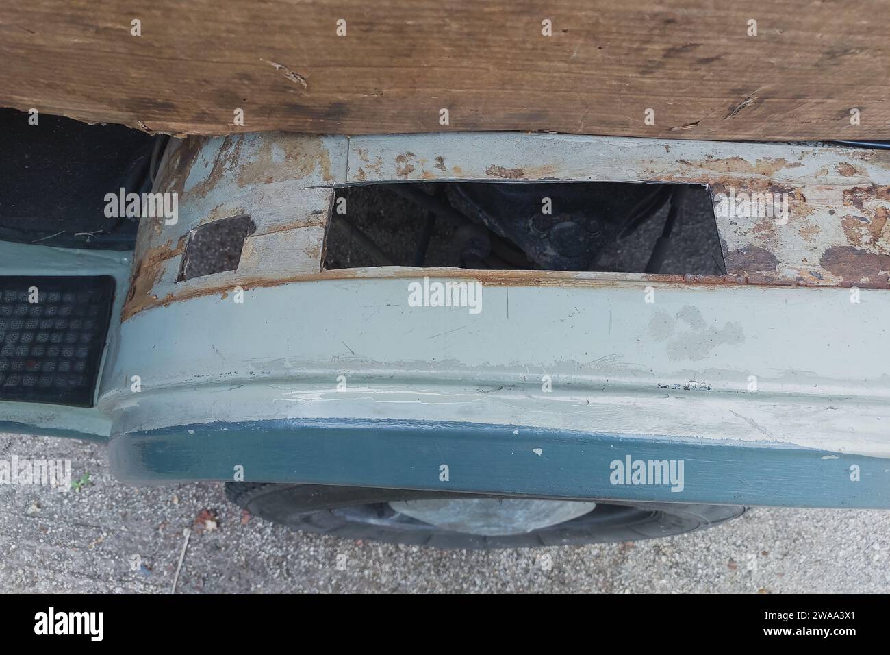 Welding a car or van inner fender. Repairing rust holes with a welding ...