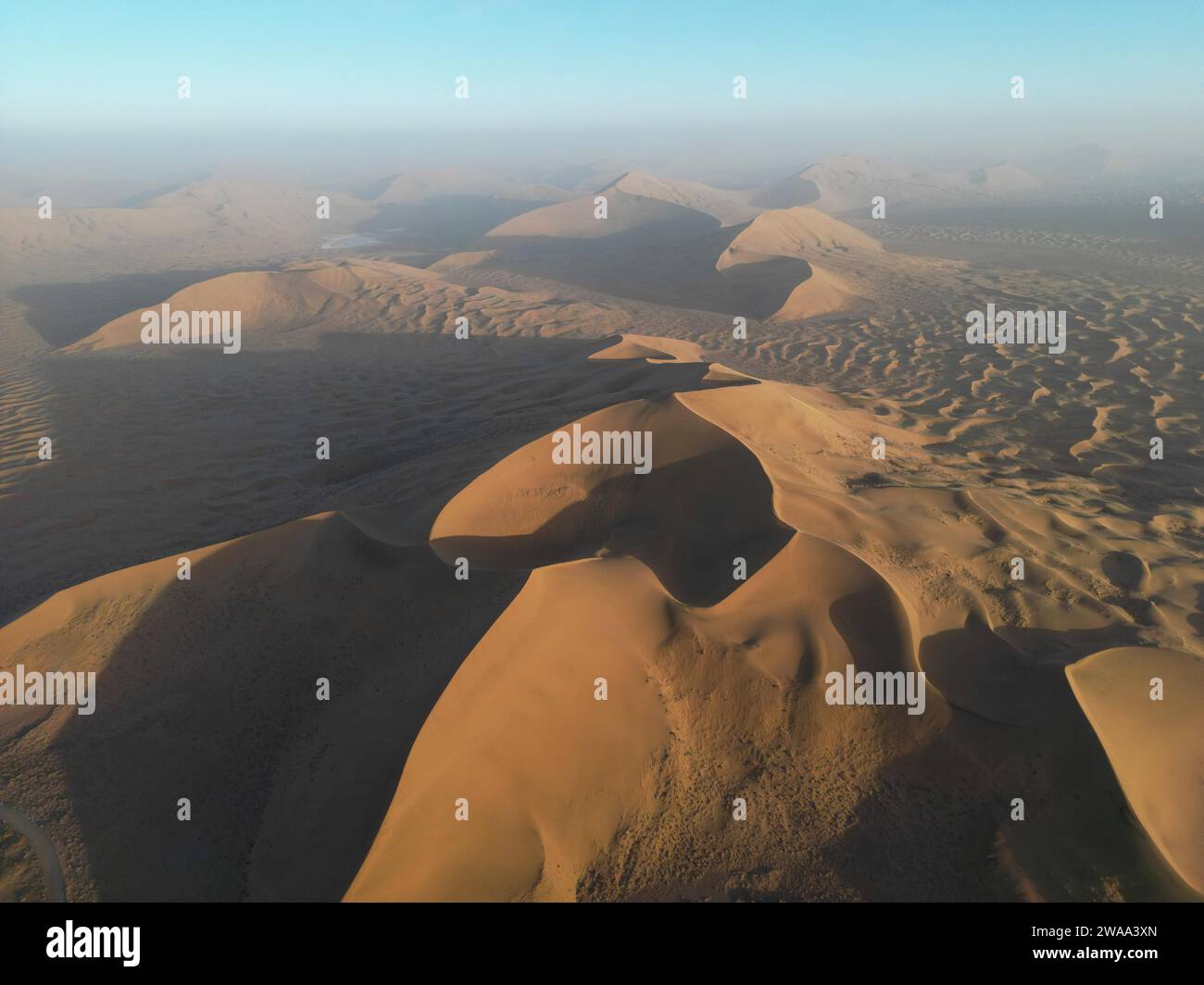 Aerial photo shows the Badain Jaran Desert of Alxa Right Banner, north ...