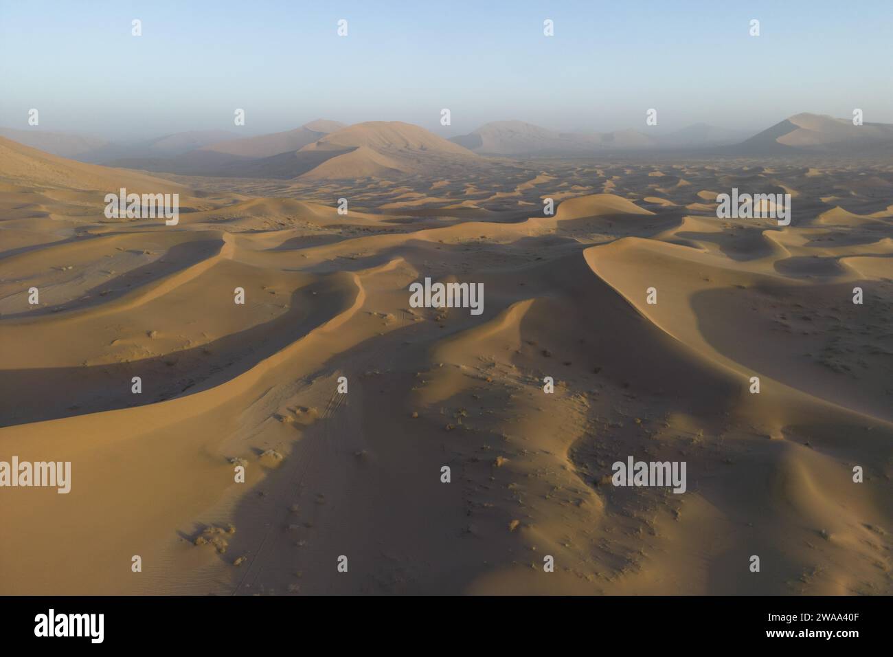 Aerial photo shows the Badain Jaran Desert of Alxa Right Banner, north ...