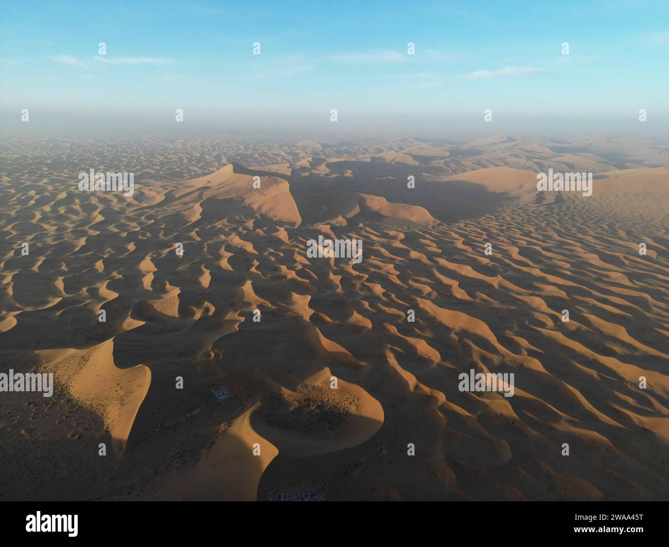 Aerial photo shows the Badain Jaran Desert of Alxa Right Banner, north ...