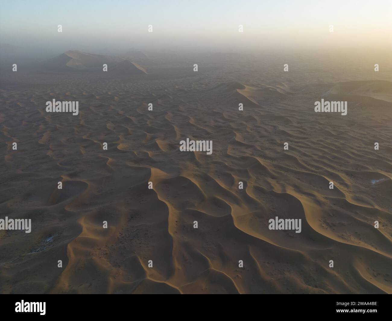 Aerial photo shows the Badain Jaran Desert of Alxa Right Banner, north ...