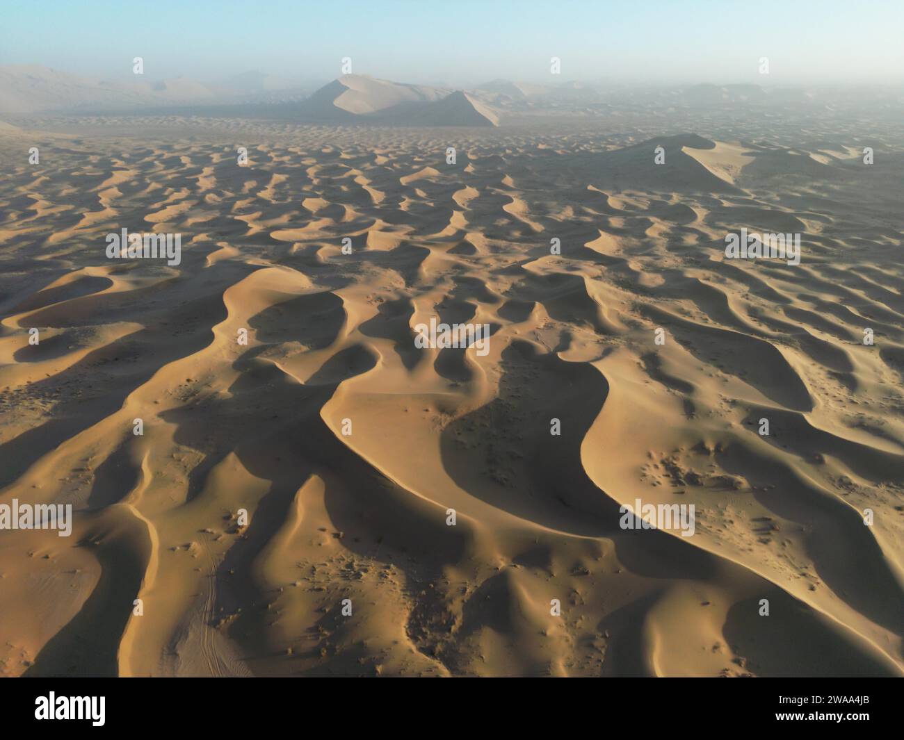 Aerial photo shows the Badain Jaran Desert of Alxa Right Banner, north ...