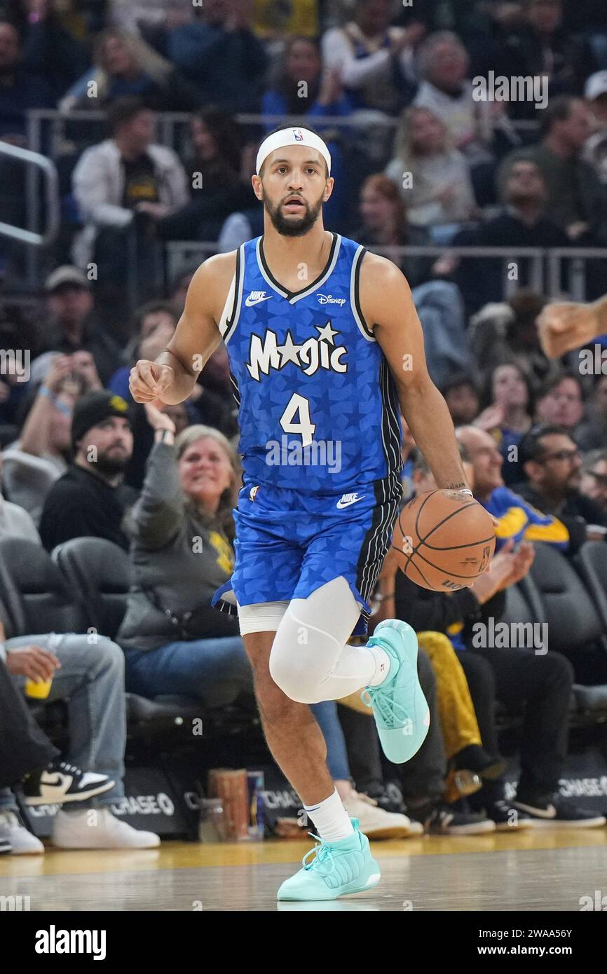 Orlando Magic guard Jalen Suggs (4) dribbles during an NBA basketball ...