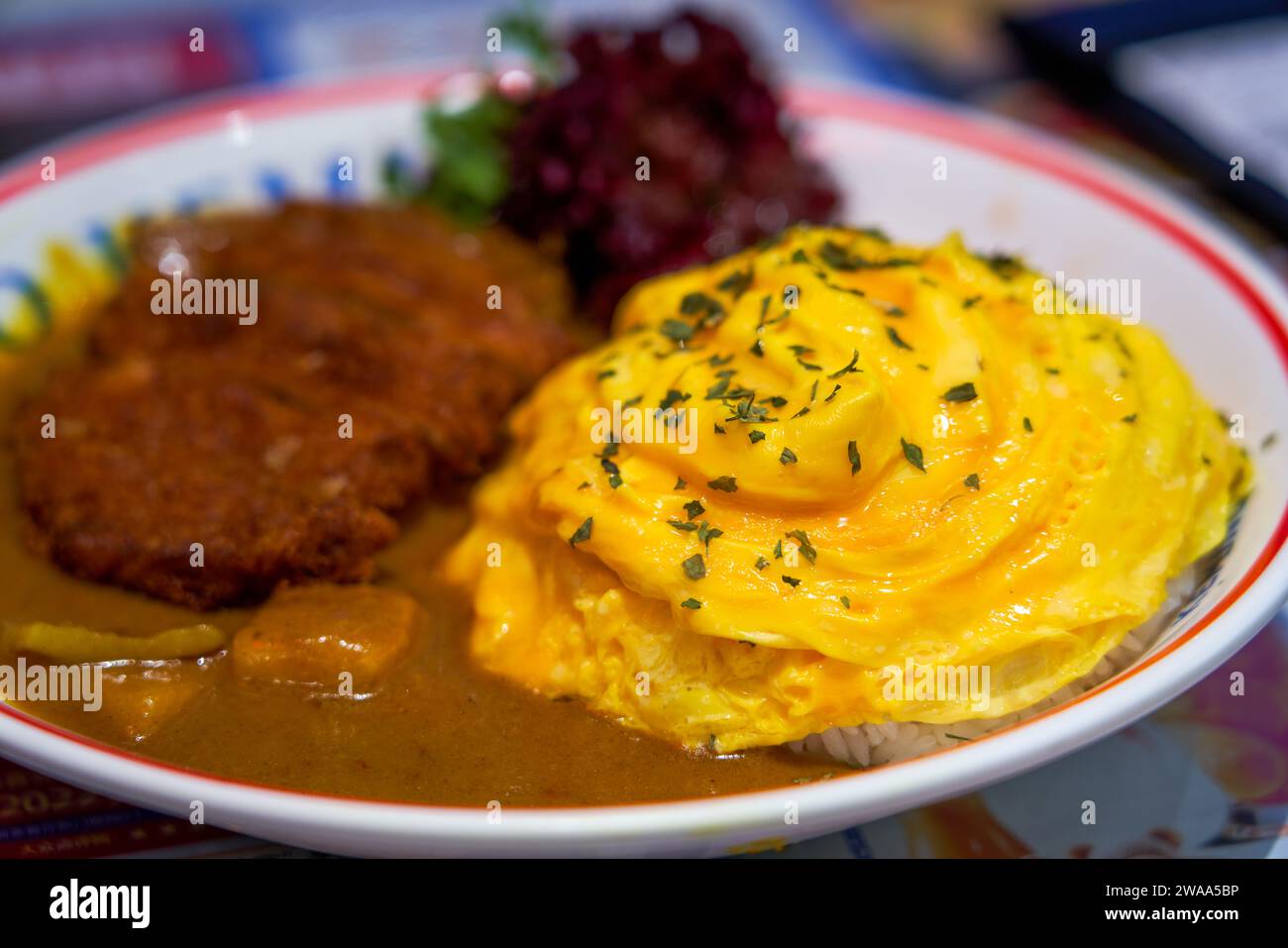 Crispy and delicious curry fried pork cutlet and omelette rice in Hong ...