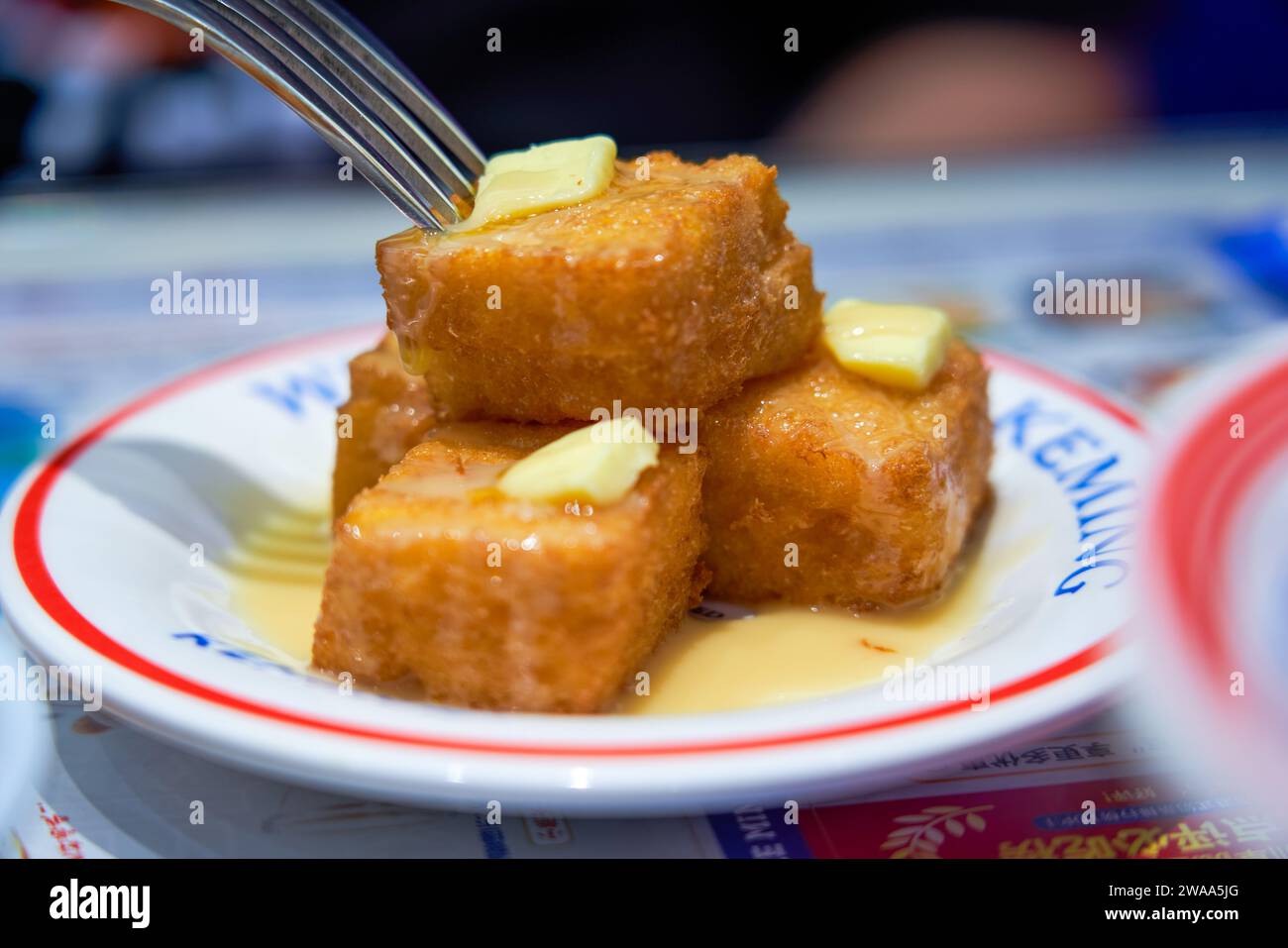 Crispy fried toast bread cubes in Hong Kong style tea restaurant Stock ...