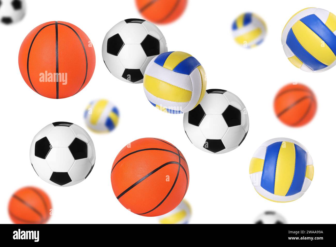 Many balls for different sports flying on white background Stock Photo ...