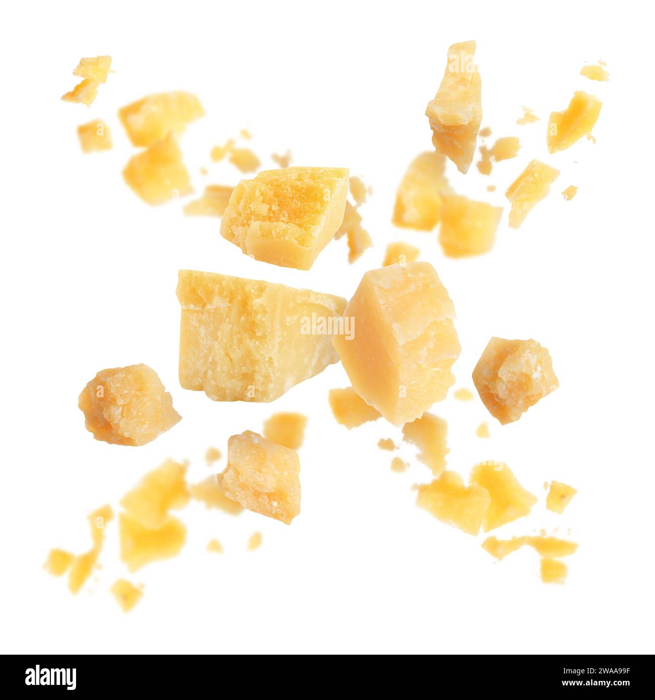 Tasty parmesan cheese falling on white background Stock Photo - Alamy
