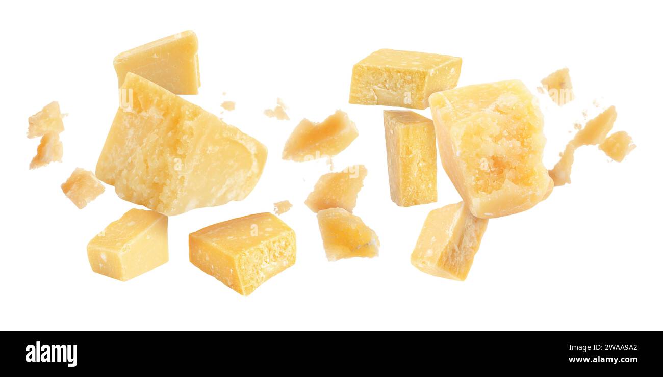 Tasty parmesan cheese falling on white background Stock Photo - Alamy