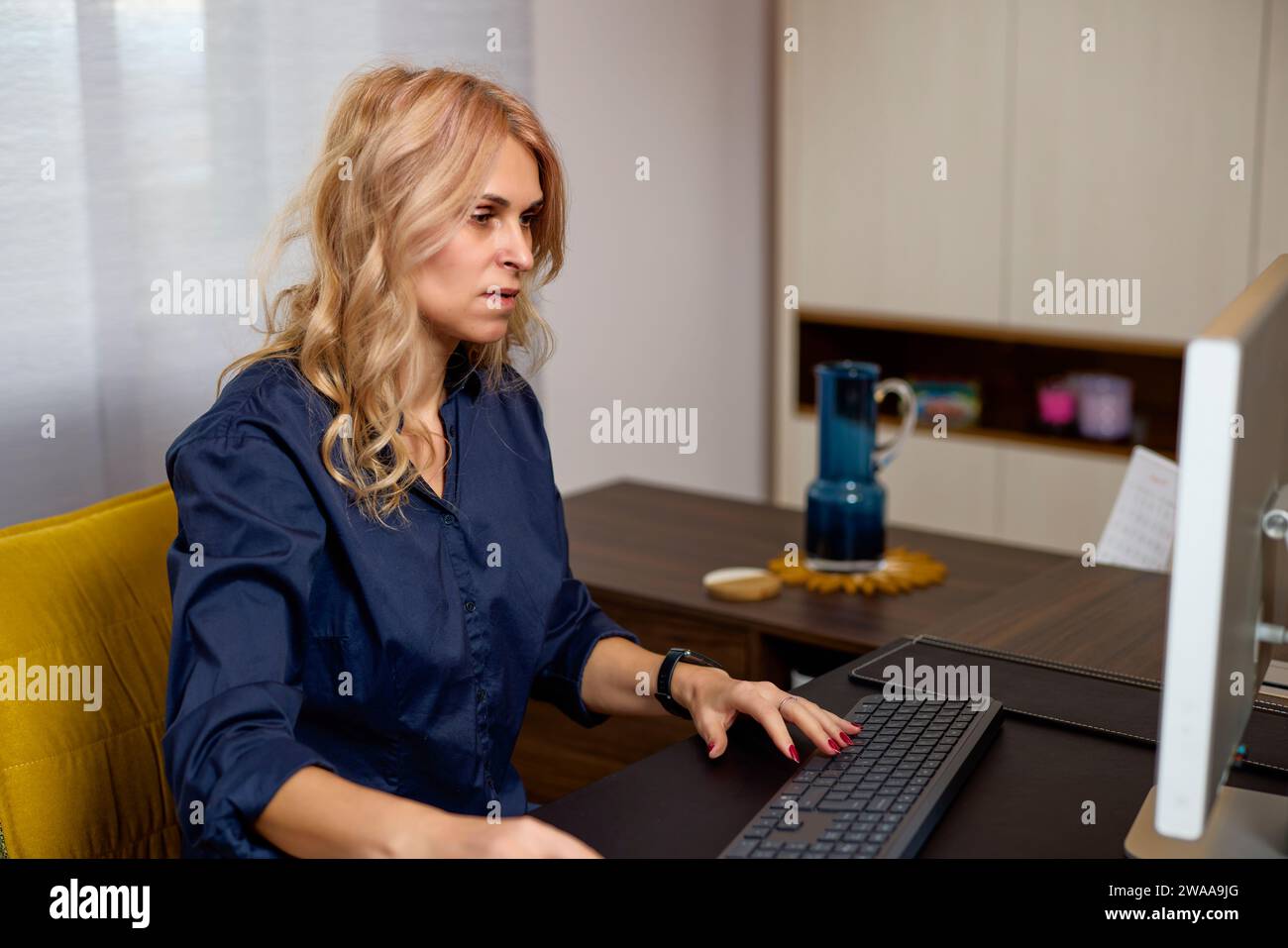 Back to work, Middle aged business woman working at office, different ...