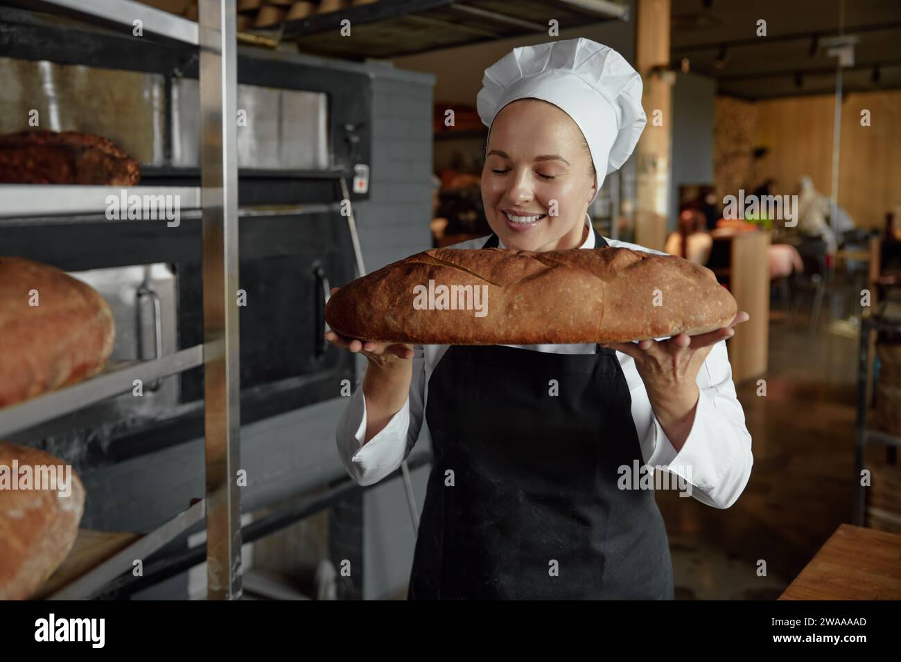 Busy bakery smiling hi-res stock photography and images - Alamy