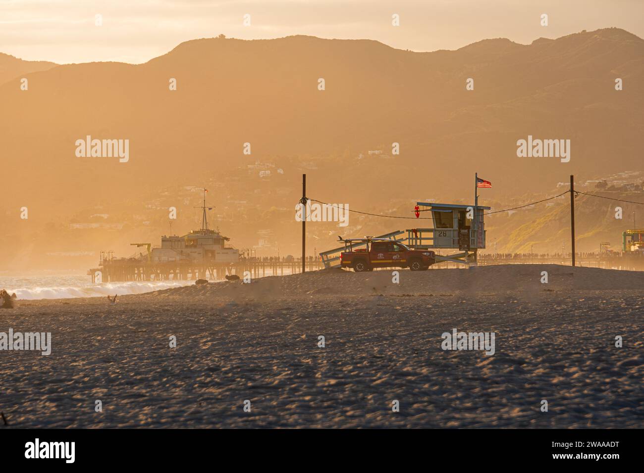 Lifeguard tower in Santa Monica at sunset in May, white sand and hazy ...