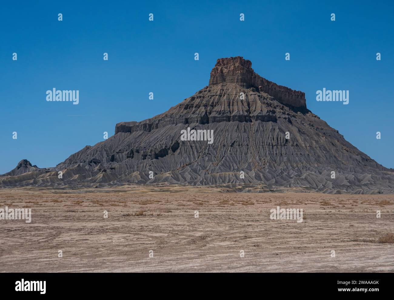 Factory Butte, a famous mountain in southern Utah, near the town of ...