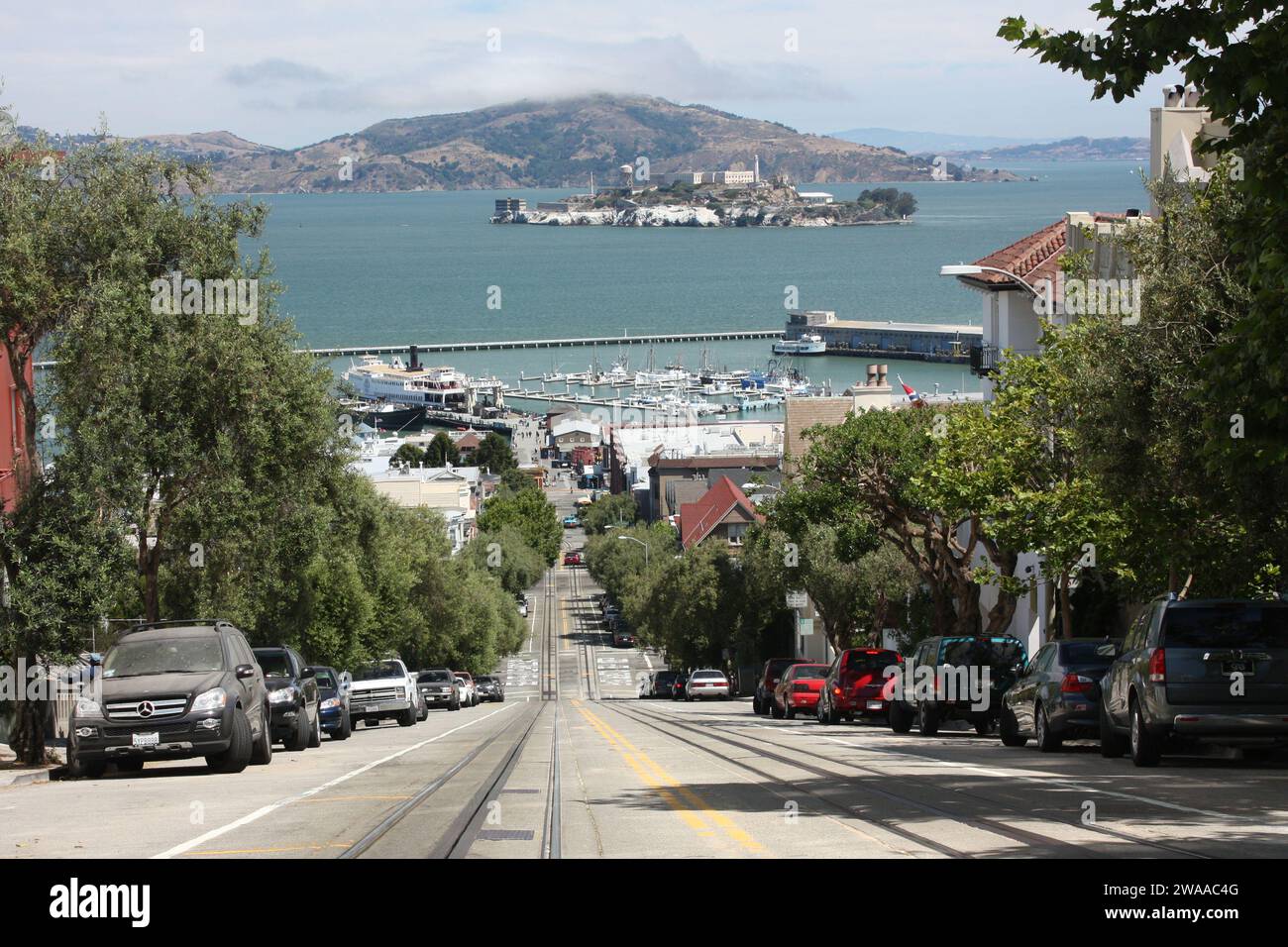 Dramatic view of Pier 33 and Alcatraz Island as seen across San ...