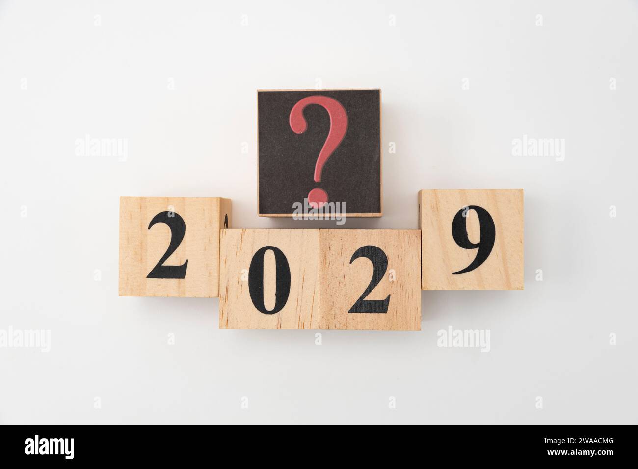 Number 2029 and question mark written on wooden blocks isolated on ...