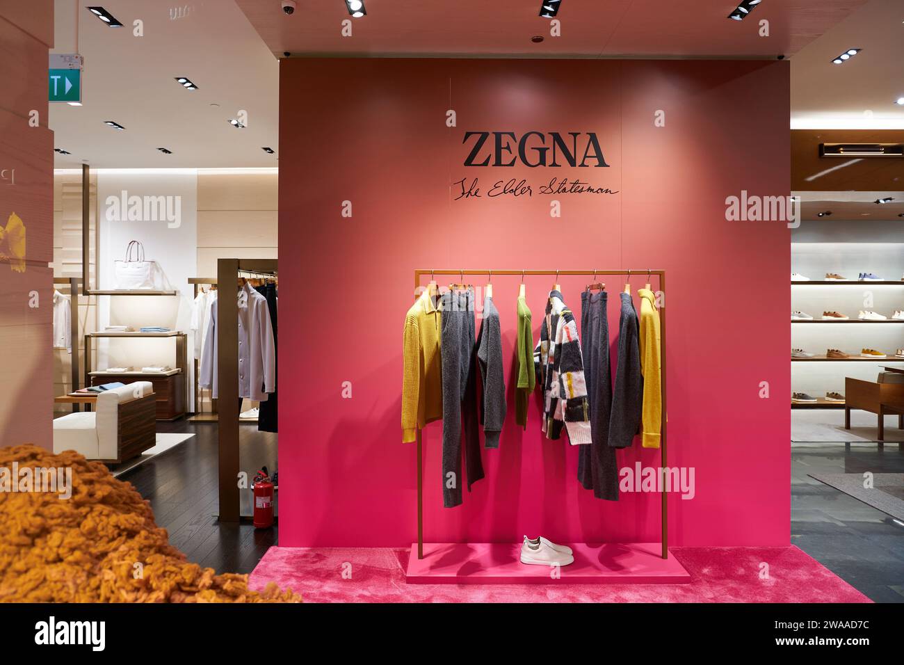 SINGAPORE - NOVEMBER 05, 2023: clothes displayed inside Zegna store in ...