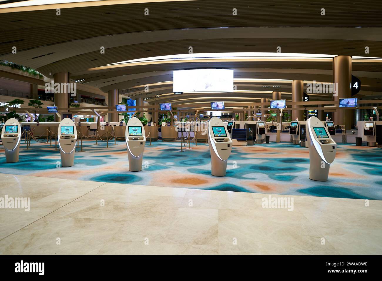 SINGAPORE - NOVEMBER 06, 2023: self check-in kiosks in Singapore Changi ...