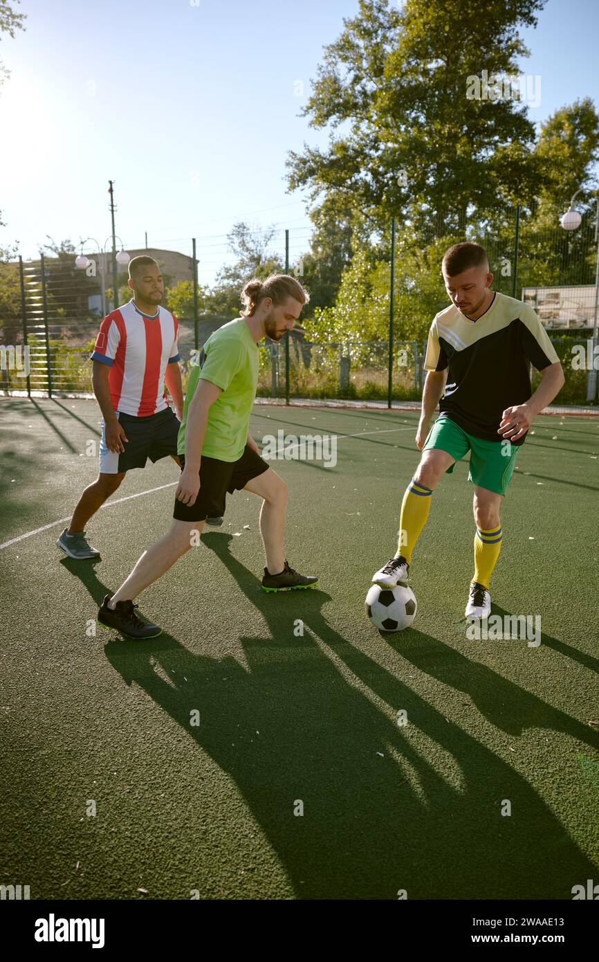 Street football on city soccer field at summer day Stock Photo - Alamy