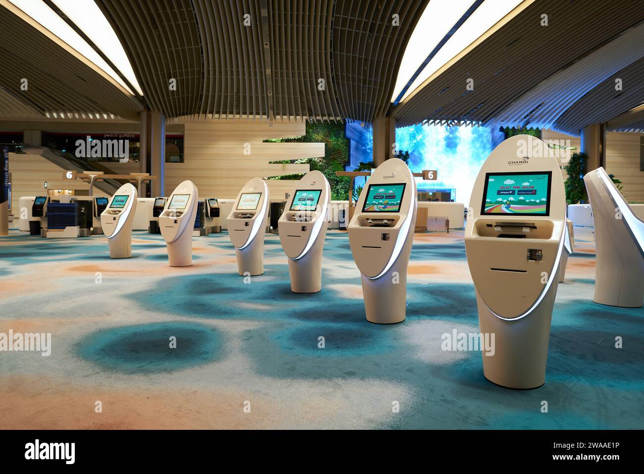 SINGAPORE - NOVEMBER 06, 2023: self check-in kiosks in Singapore Changi ...