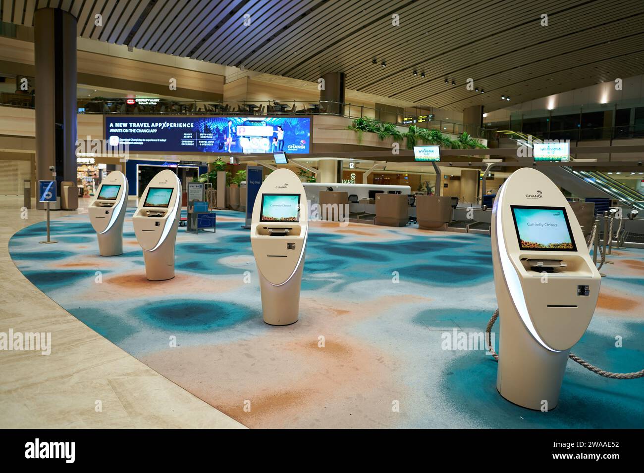 SINGAPORE - NOVEMBER 06, 2023: self check-in kiosks in Singapore Changi ...
