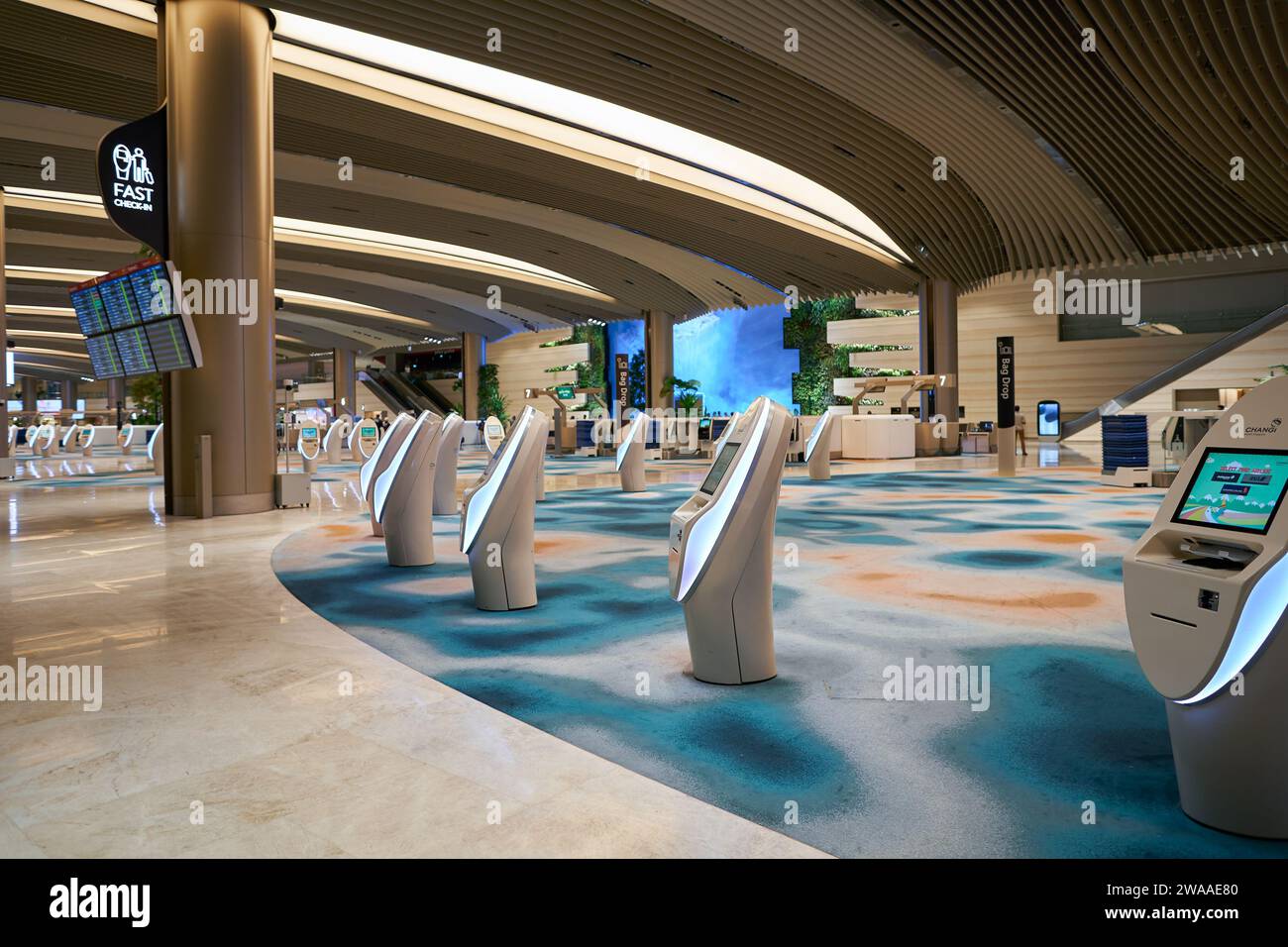 SINGAPORE - NOVEMBER 06, 2023: self check-in kiosks in Singapore Changi ...