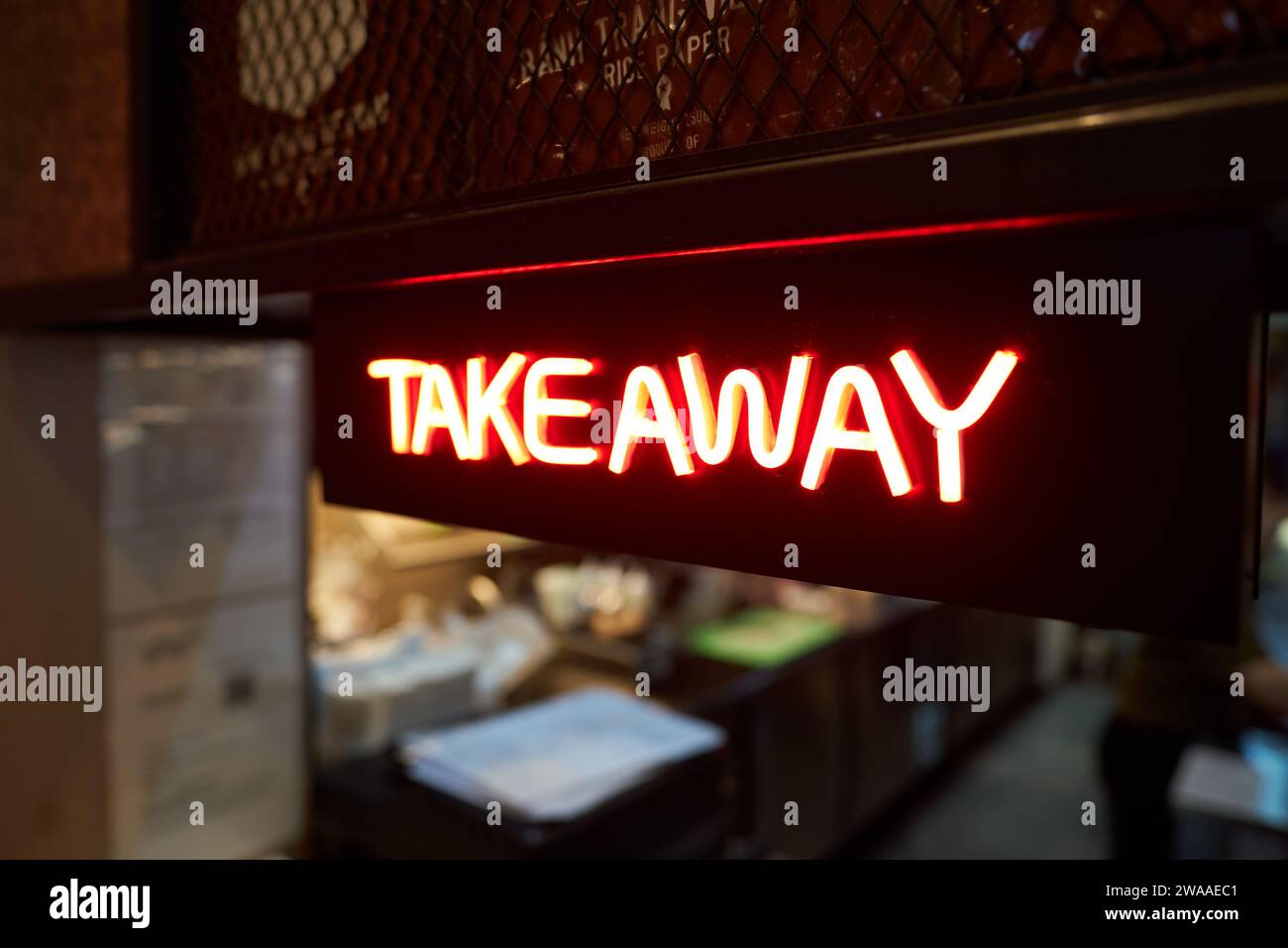 SINGAPORE - NOVEMBER 06, 2023: close up shot of "take away" sign as ...