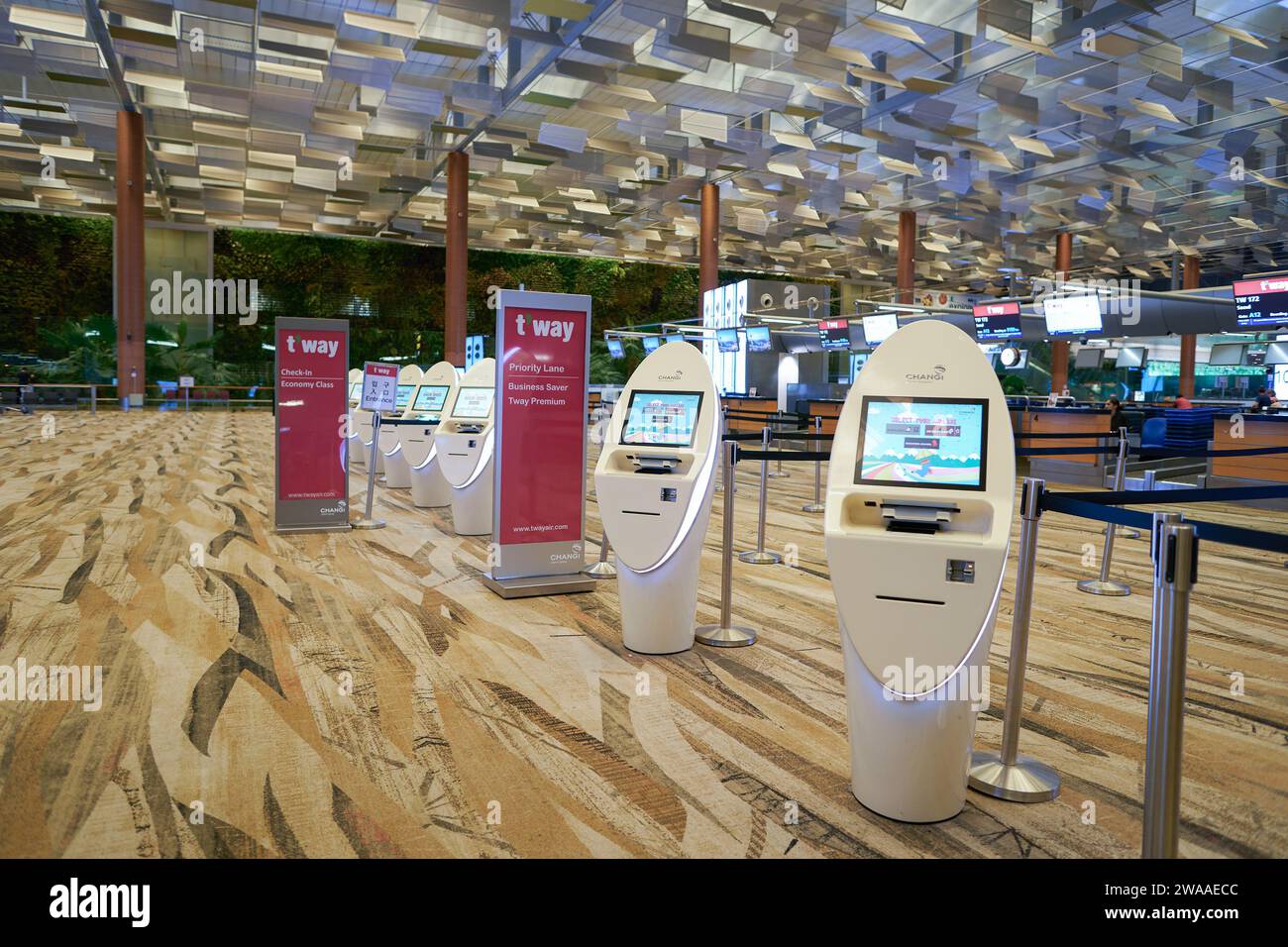SINGAPORE - NOVEMBER 06, 2023: self check-in kiosks in Singapore Changi ...