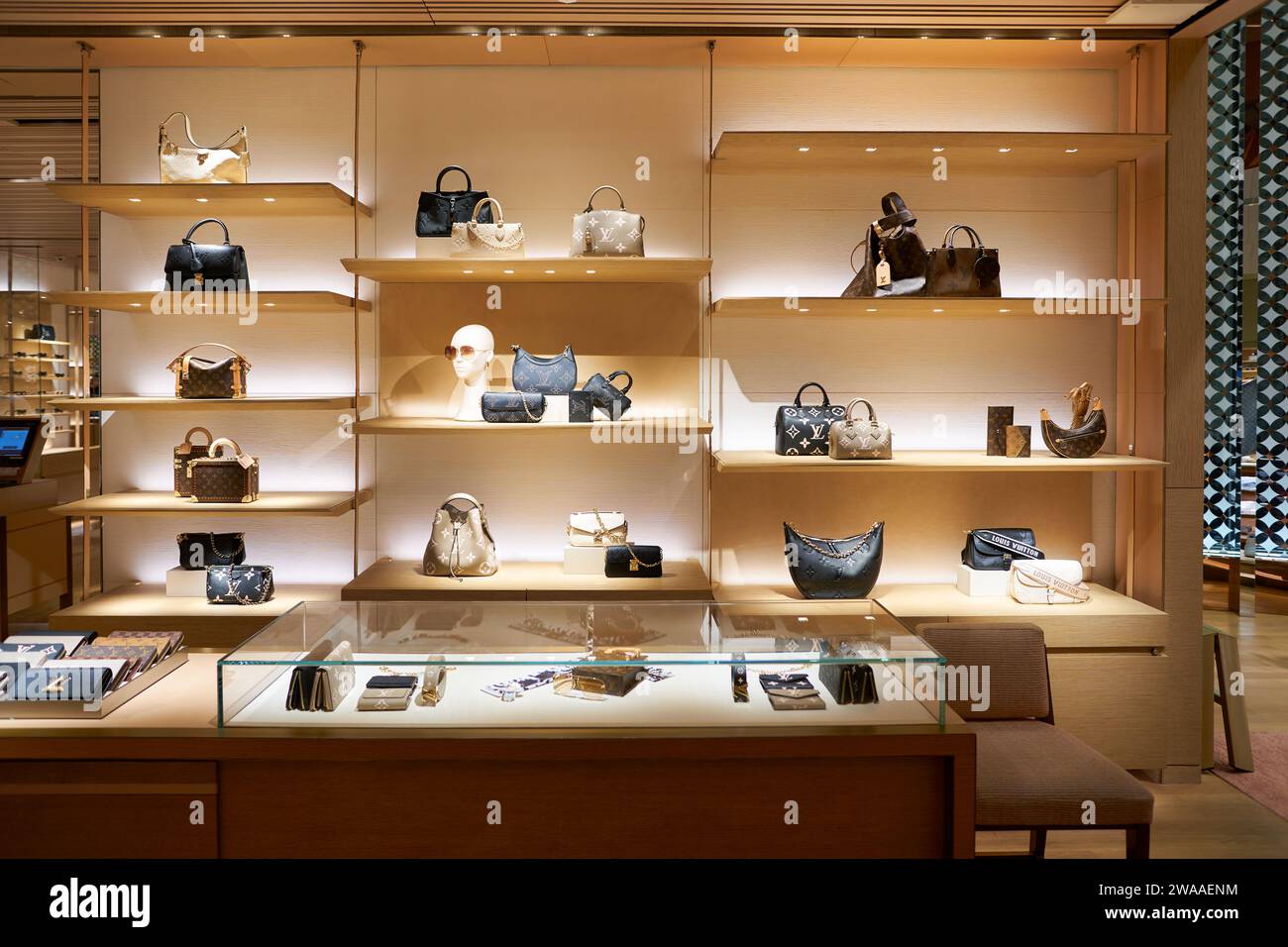 SINGAPORE - NOVEMBER 07, 2023: bags on display inside Louis Vuitton ...