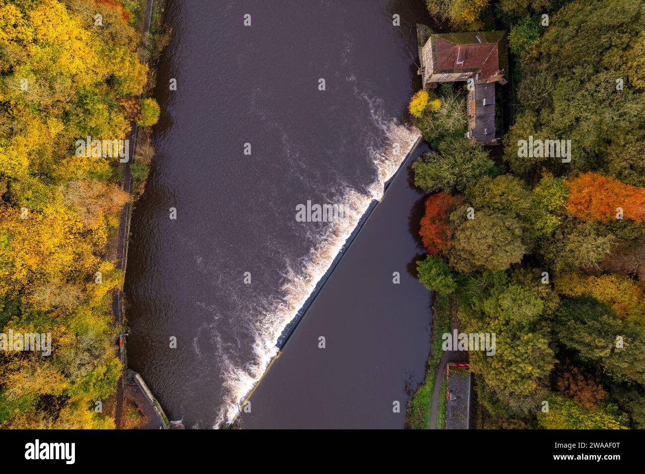 Top down aerial view of Cron Mill and Weir on River Wear at the height ...