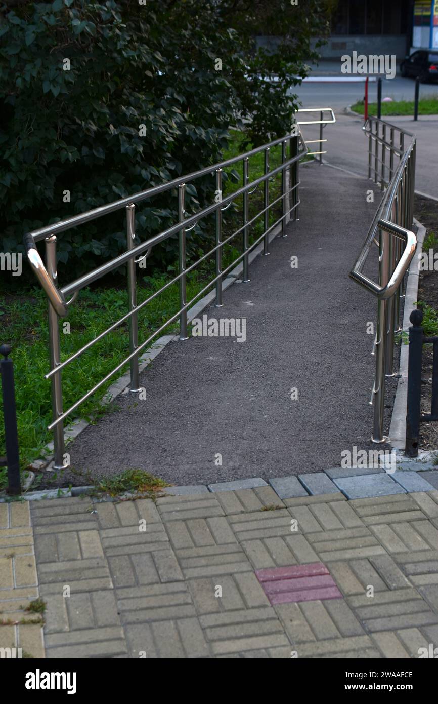 Shiny metal ramp for the disabled. A special path for the disabled ...