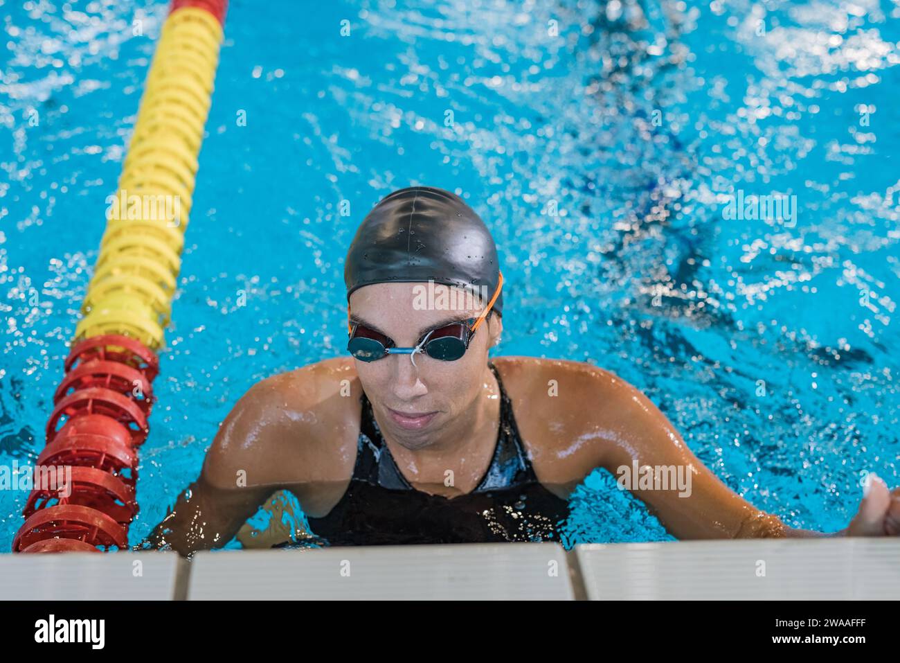 Happy professional swimmer in goggles hi-res stock photography and ...