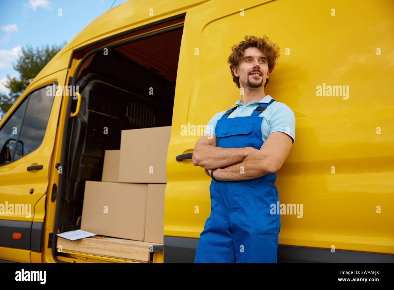 Delivery male employee in hi-res stock photography and images - Alamy