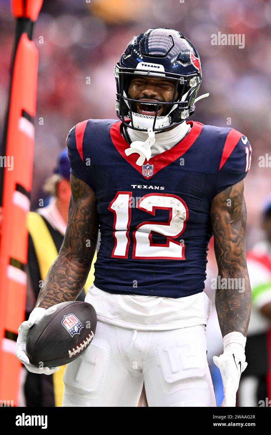 Houston Texans wide receiver Nico Collins (12) reacts against the ...