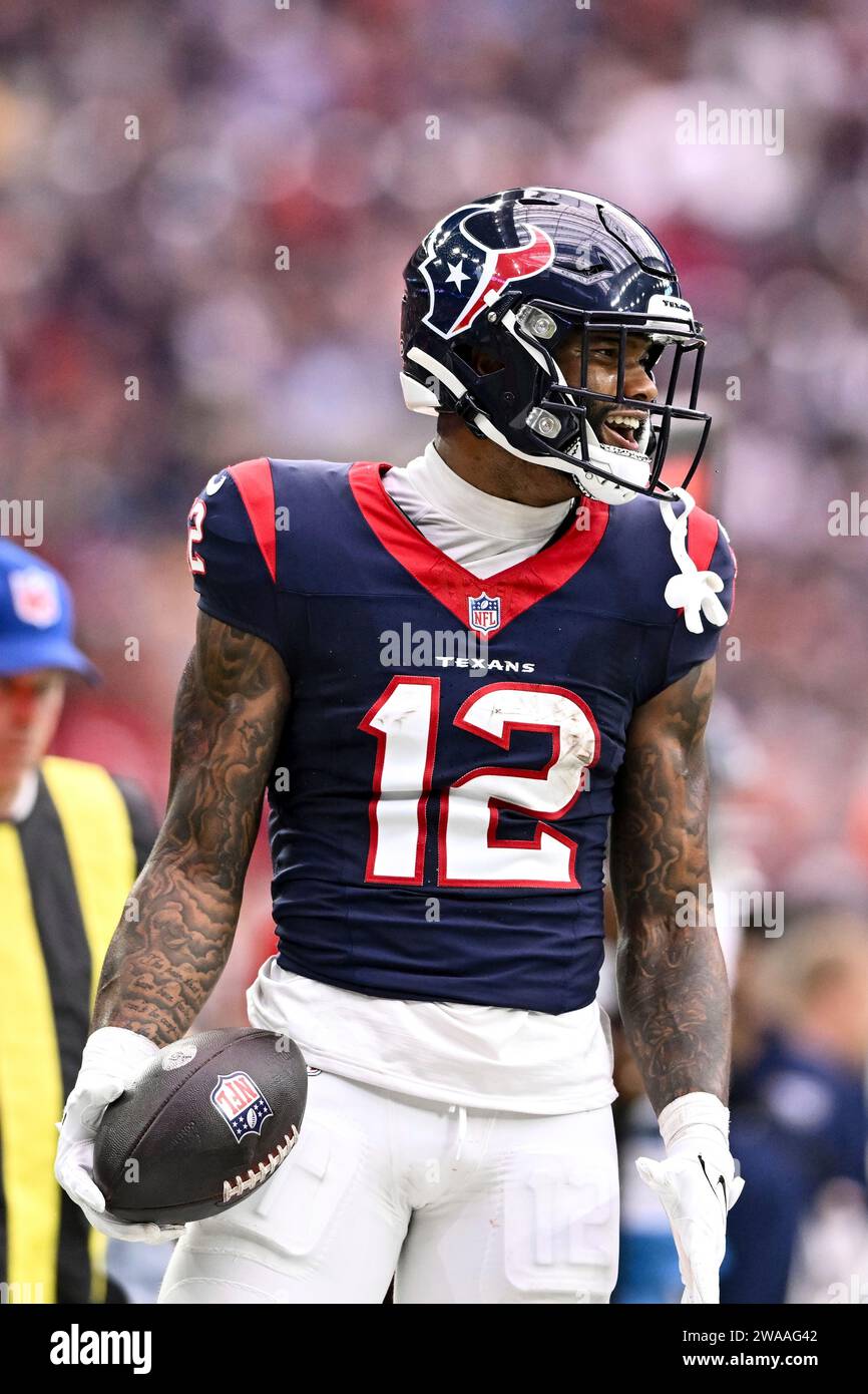 Houston Texans wide receiver Nico Collins (12) reacts against the ...
