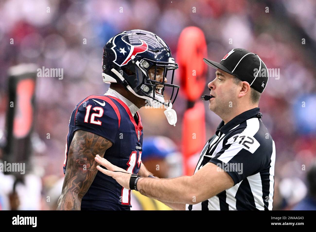 Houston Texans wide receiver Nico Collins (12) reacts against the ...