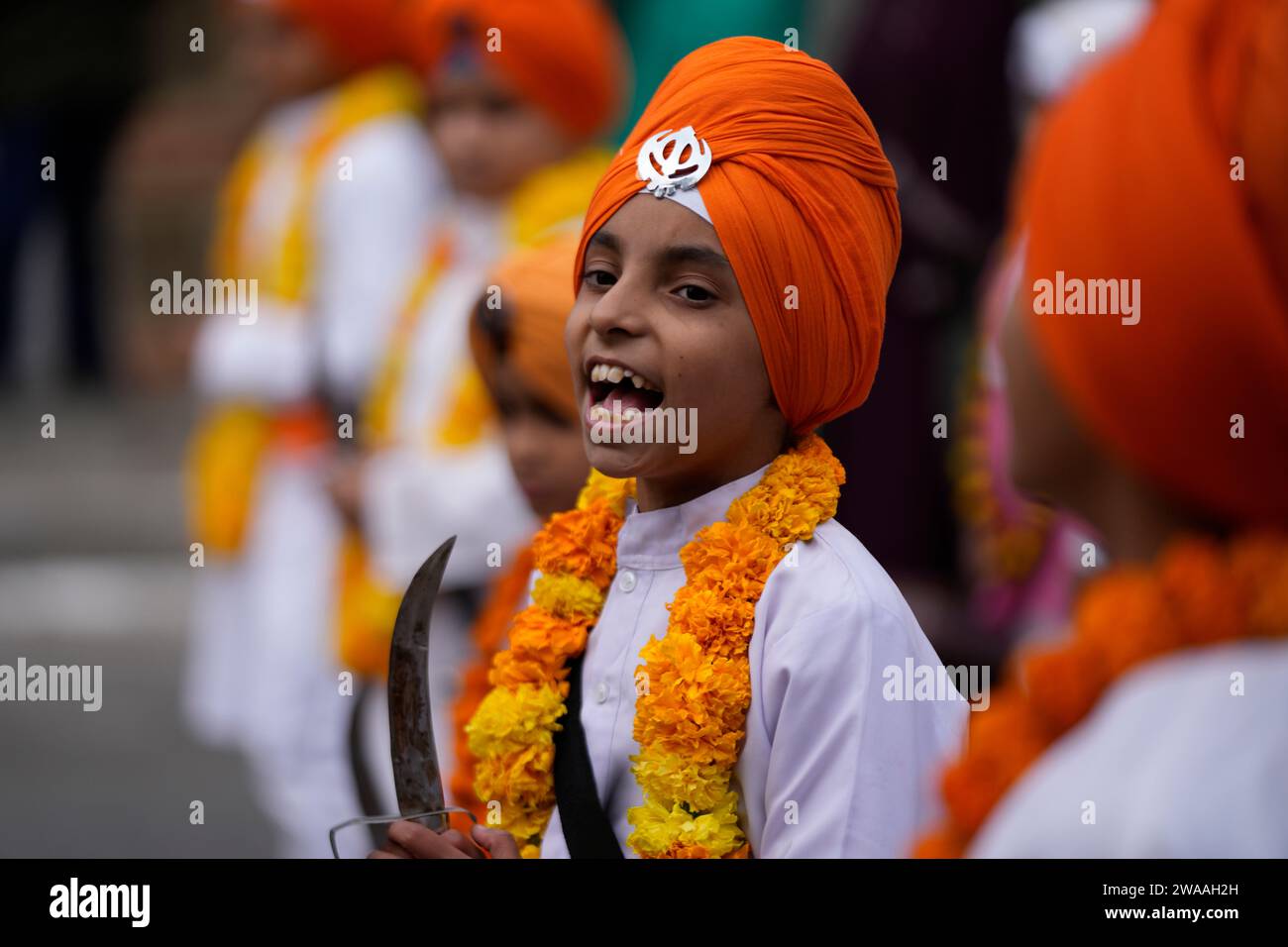 Indian Sikh children participate in a religious procession ahead of the birth anniversary of ...