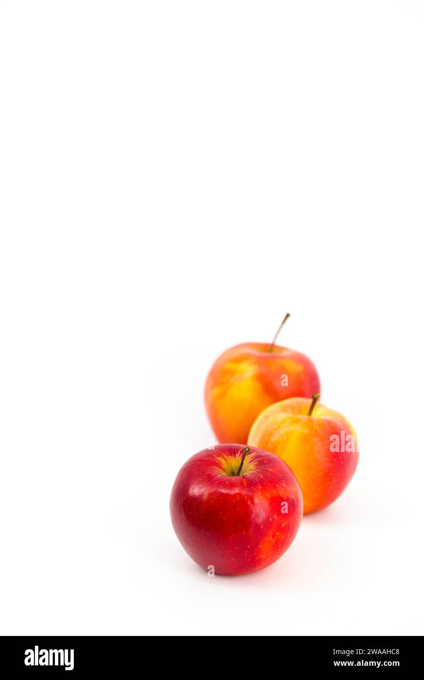 The image captures the vibrant contrast of red apples against a ...
