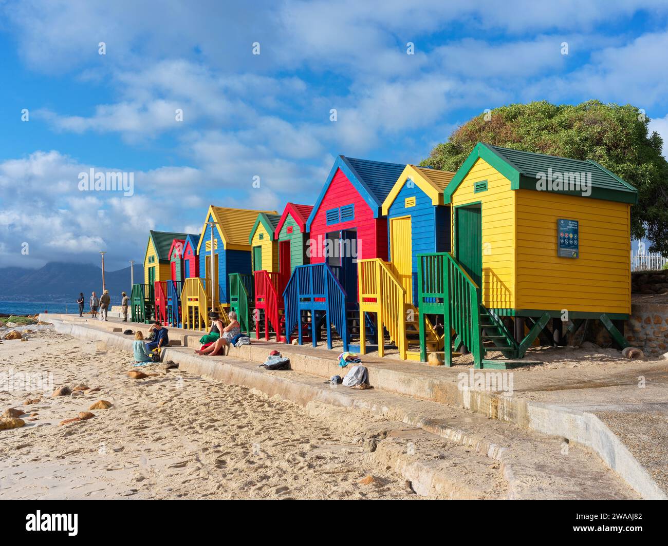 Beach Huts at False Bay, Muizenberg, Cape Town. Brightly coloured beach ...
