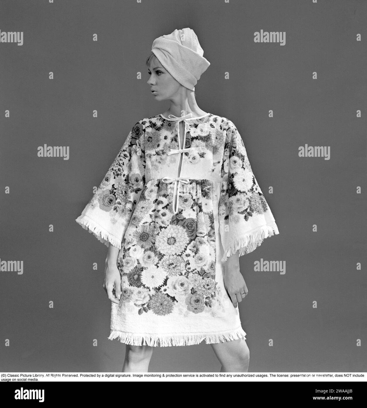 In the 1960s. A fashion model dressed in a summer outfit, like a ...