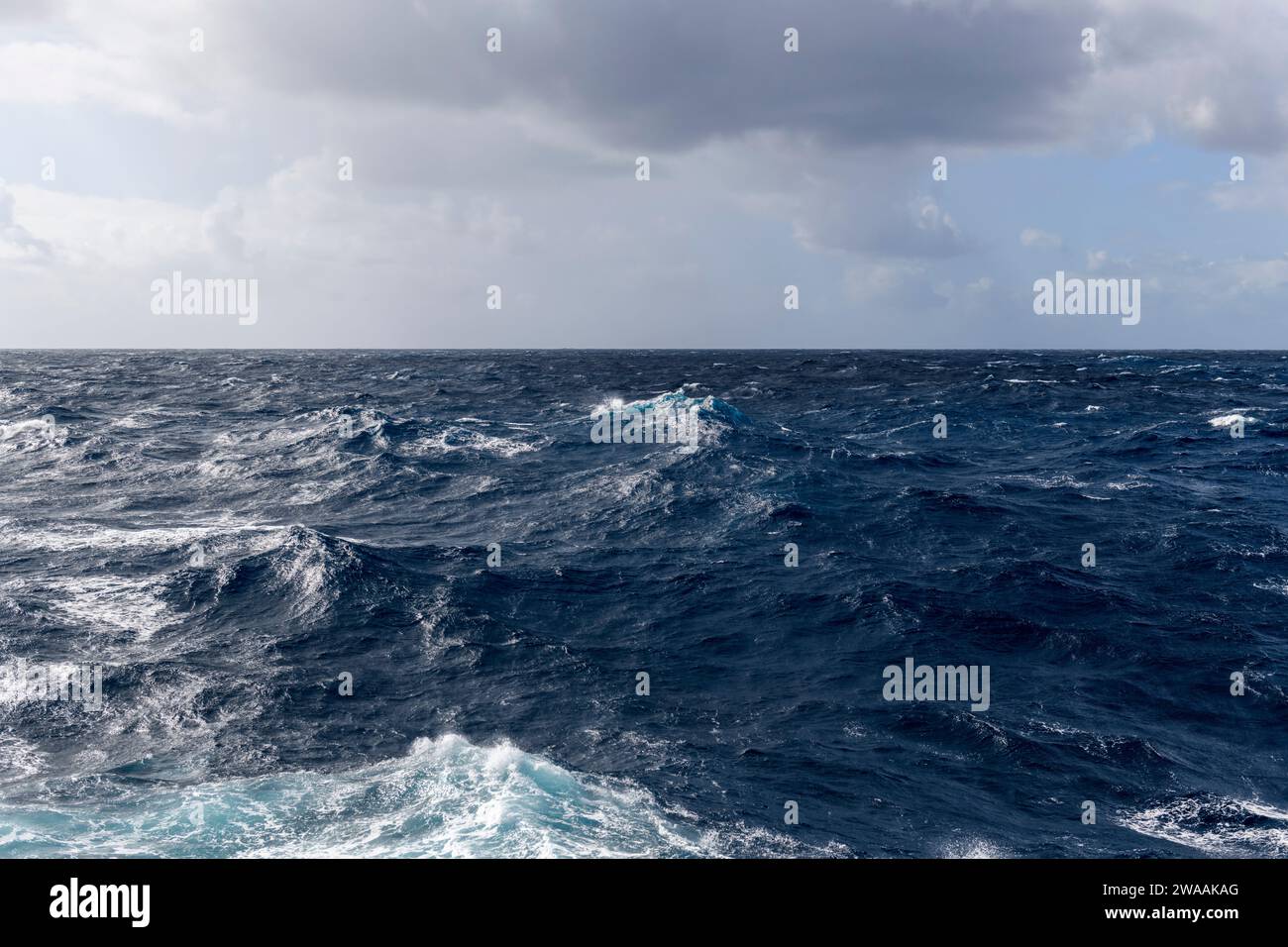 Beautiful seascape - waves and sky with clouds with beautiful lighting ...