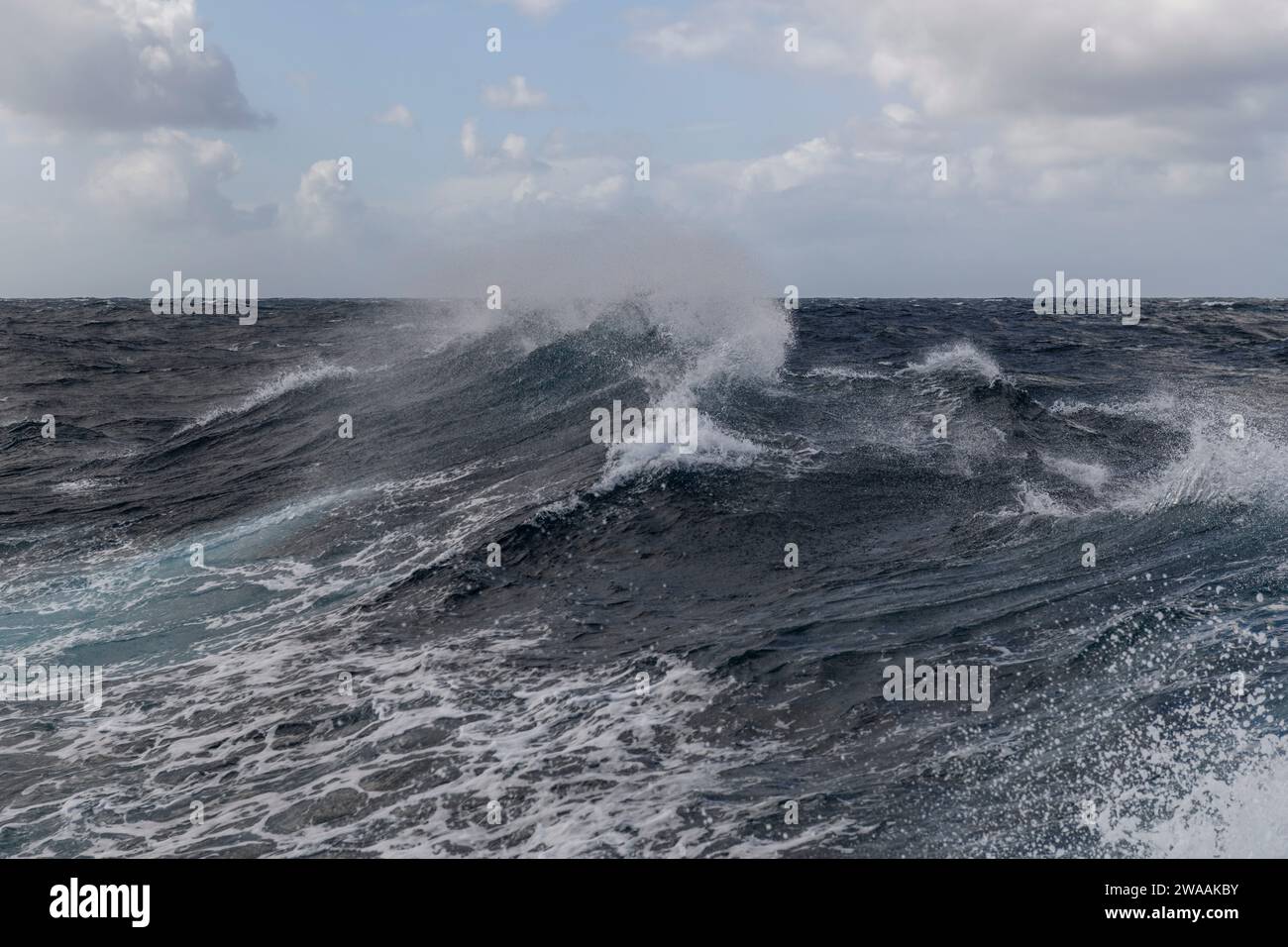 Beautiful seascape - waves and sky with clouds with beautiful lighting ...