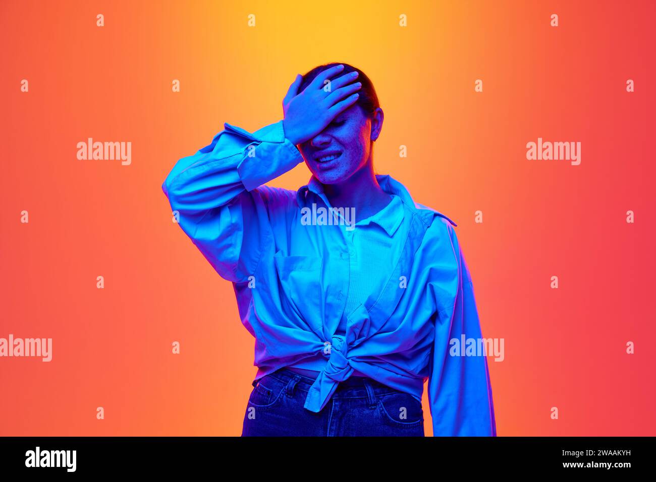 Failed. Young girl in upset feelings put her hand to her face, closing ...