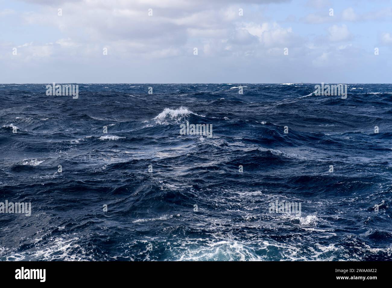 Beautiful seascape - waves and sky with clouds with beautiful lighting ...
