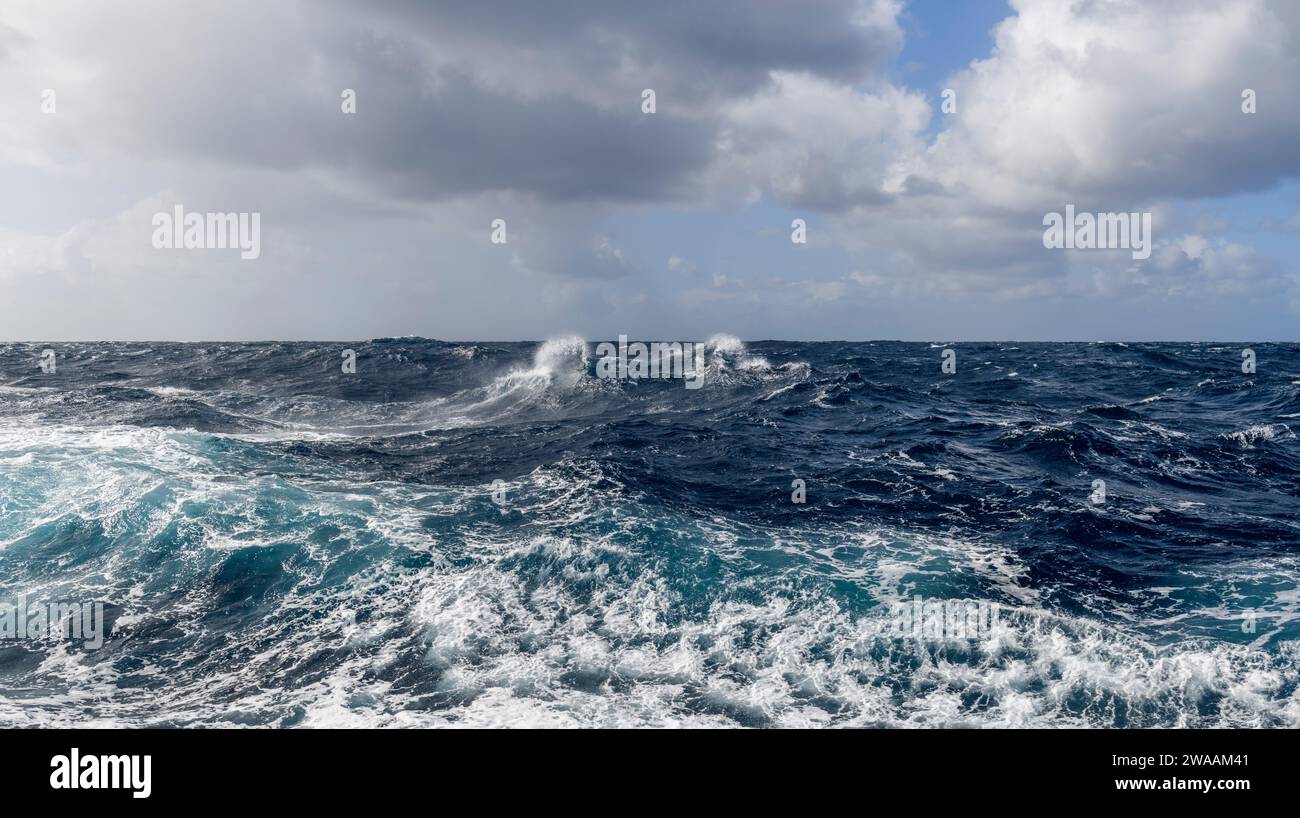 Beautiful seascape - waves and sky with clouds with beautiful lighting ...