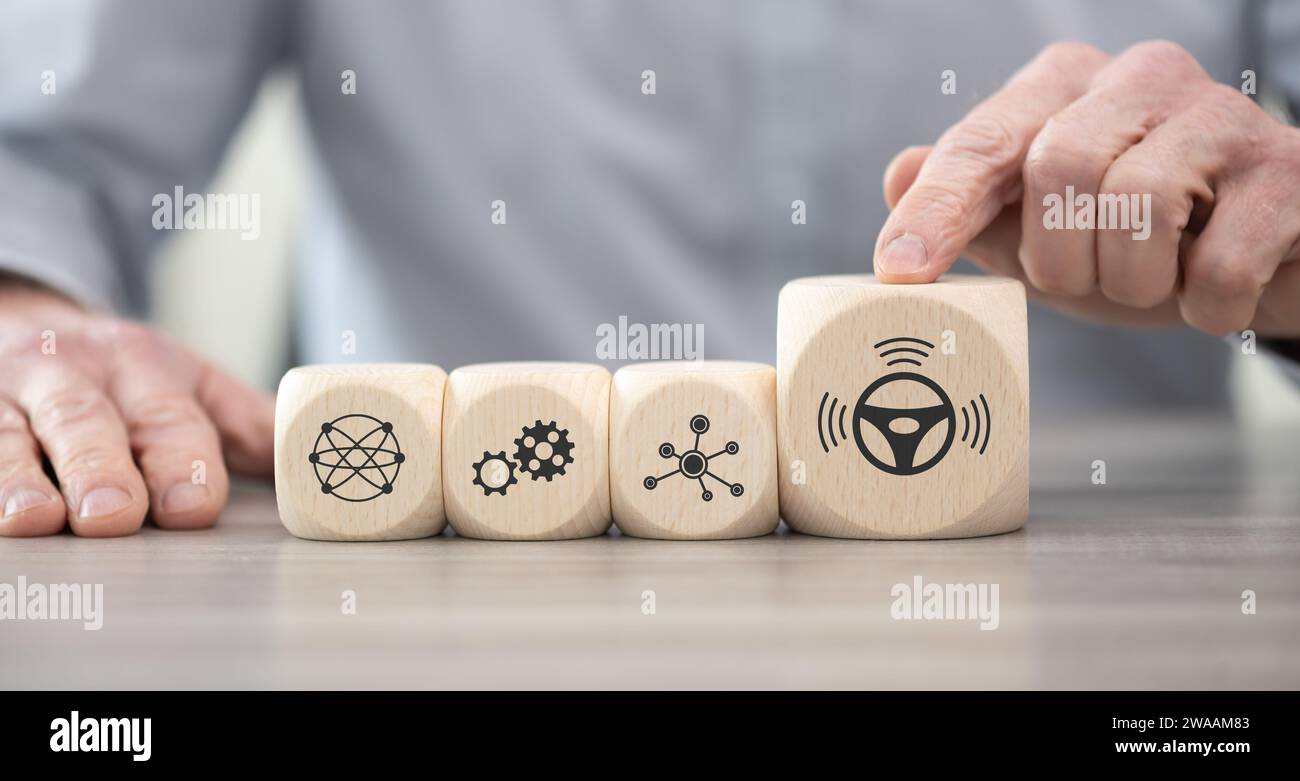 Wooden blocks with symbol of self-driving car concept Stock Photo - Alamy